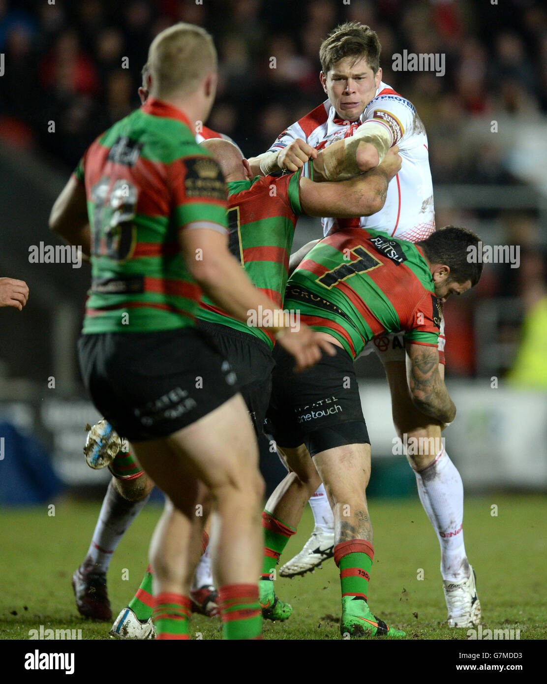 St Helens' Louie McCarthy-Scarsbrook is stopped by South Sydney ...