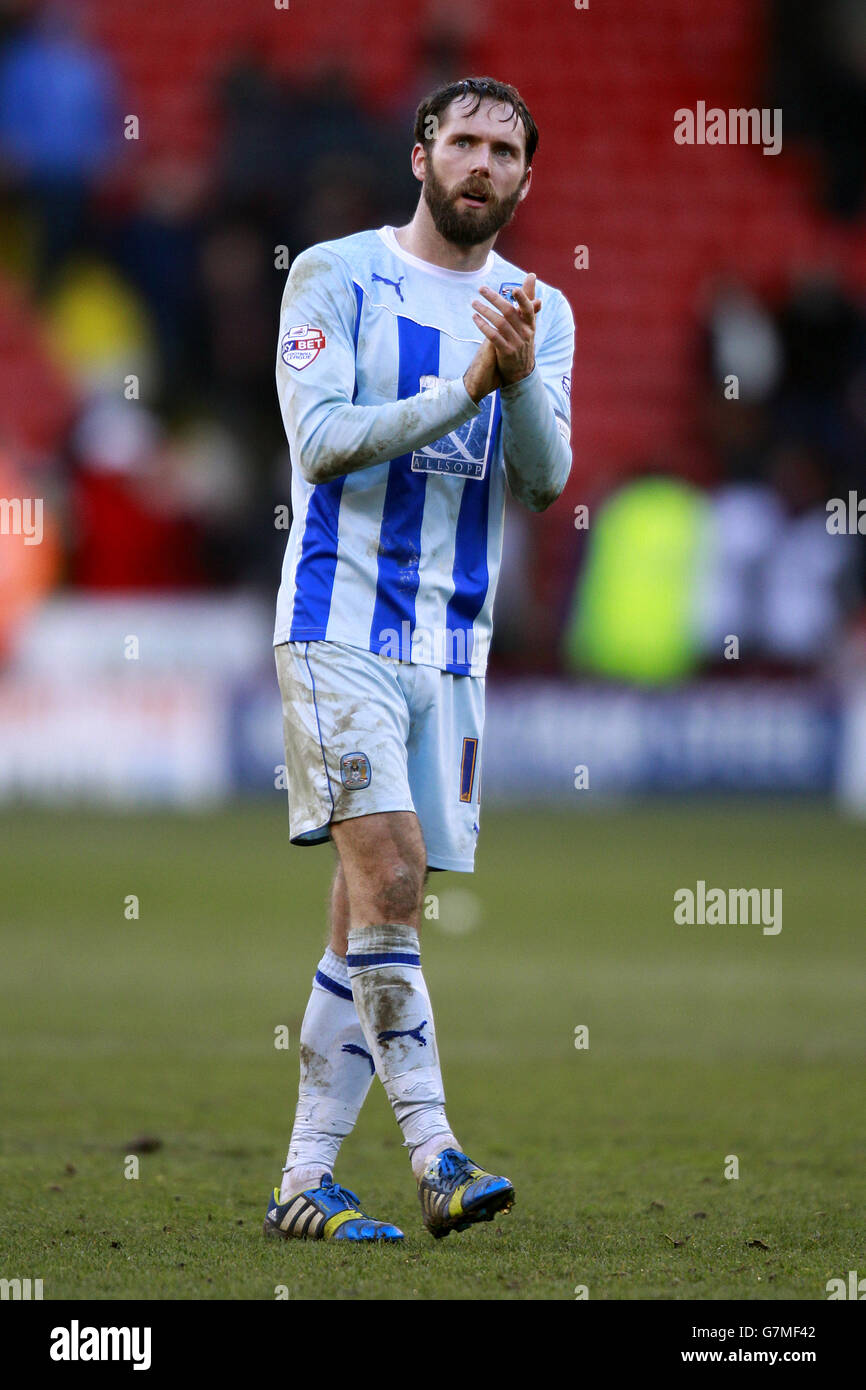 Coventry City captain James O'Brien applauds the travelling support ...