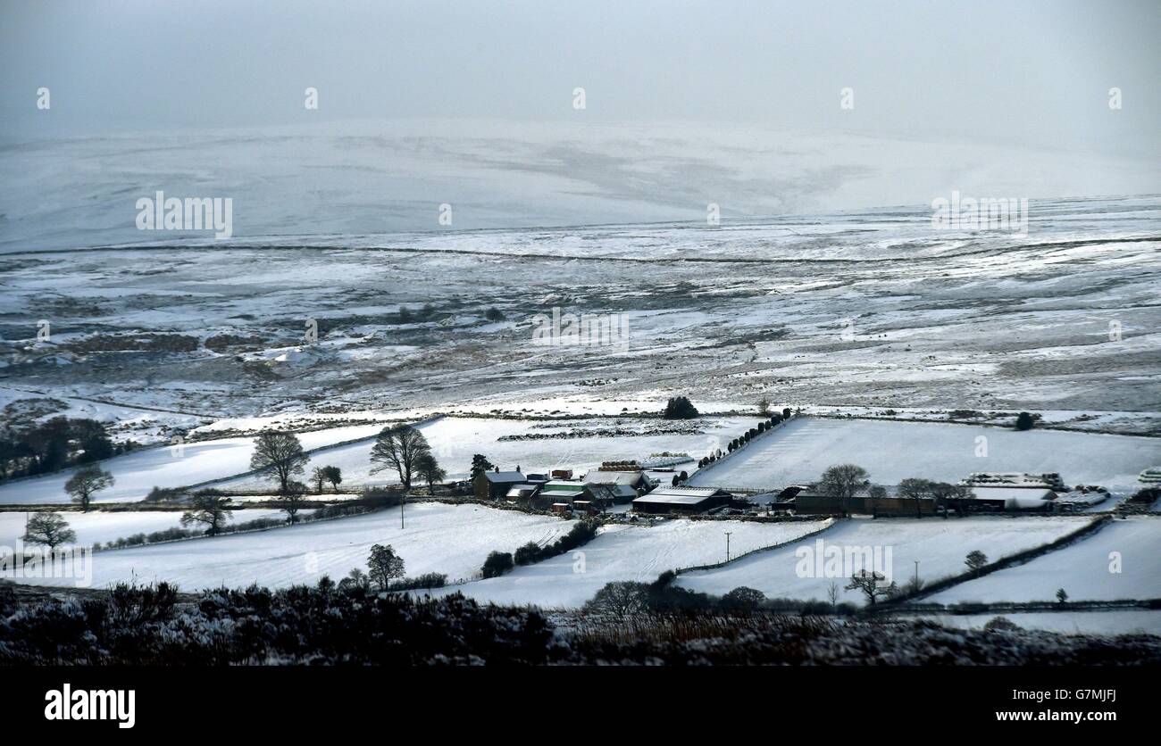 A farmhouse shrouded in snow on the Yorkshire Moors, as parts of ...