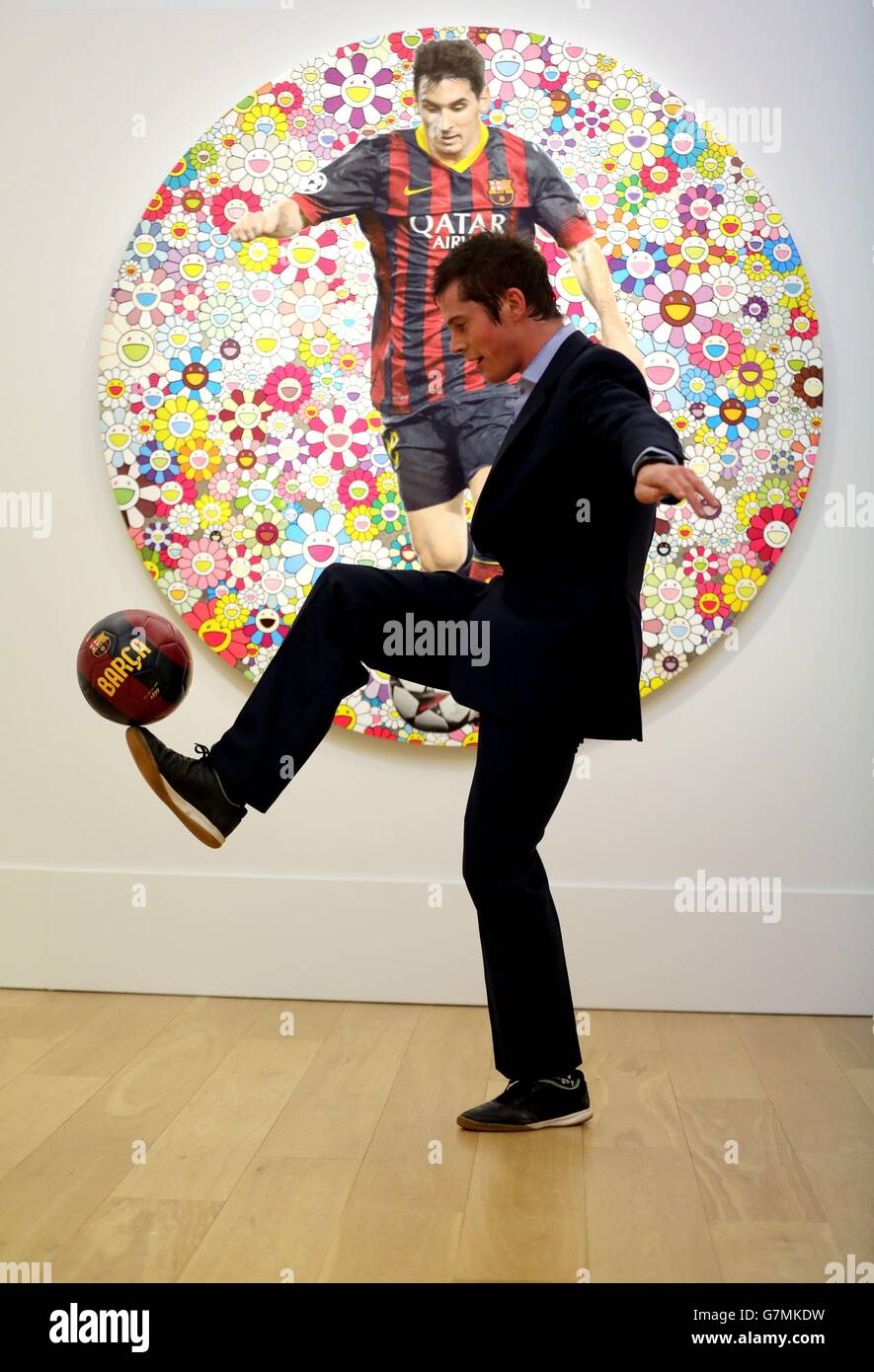 Football freestyler John Farnworth perfoms in front of Takashi Murakami ...