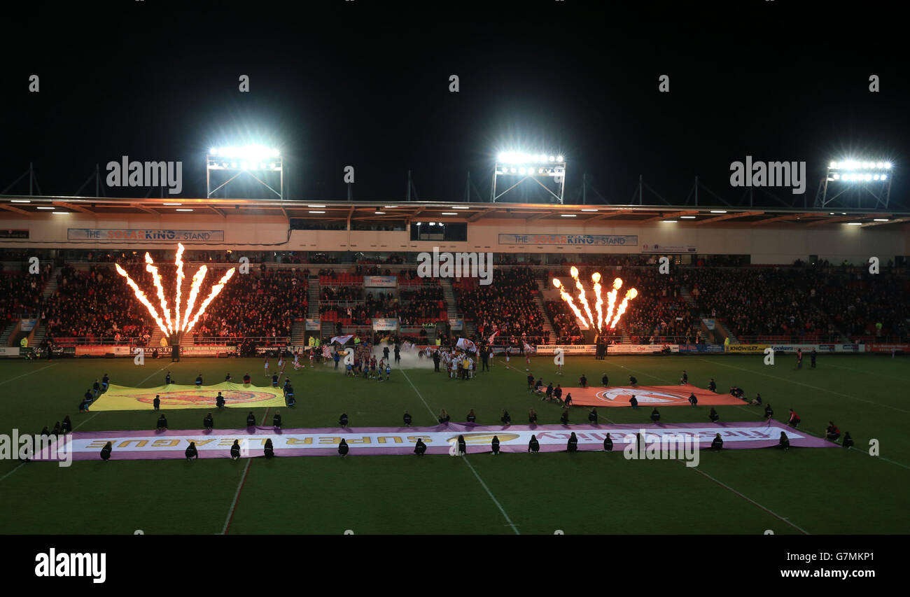 St Helens and Catalans Dragons players walk on to the pitch at Langtree ...