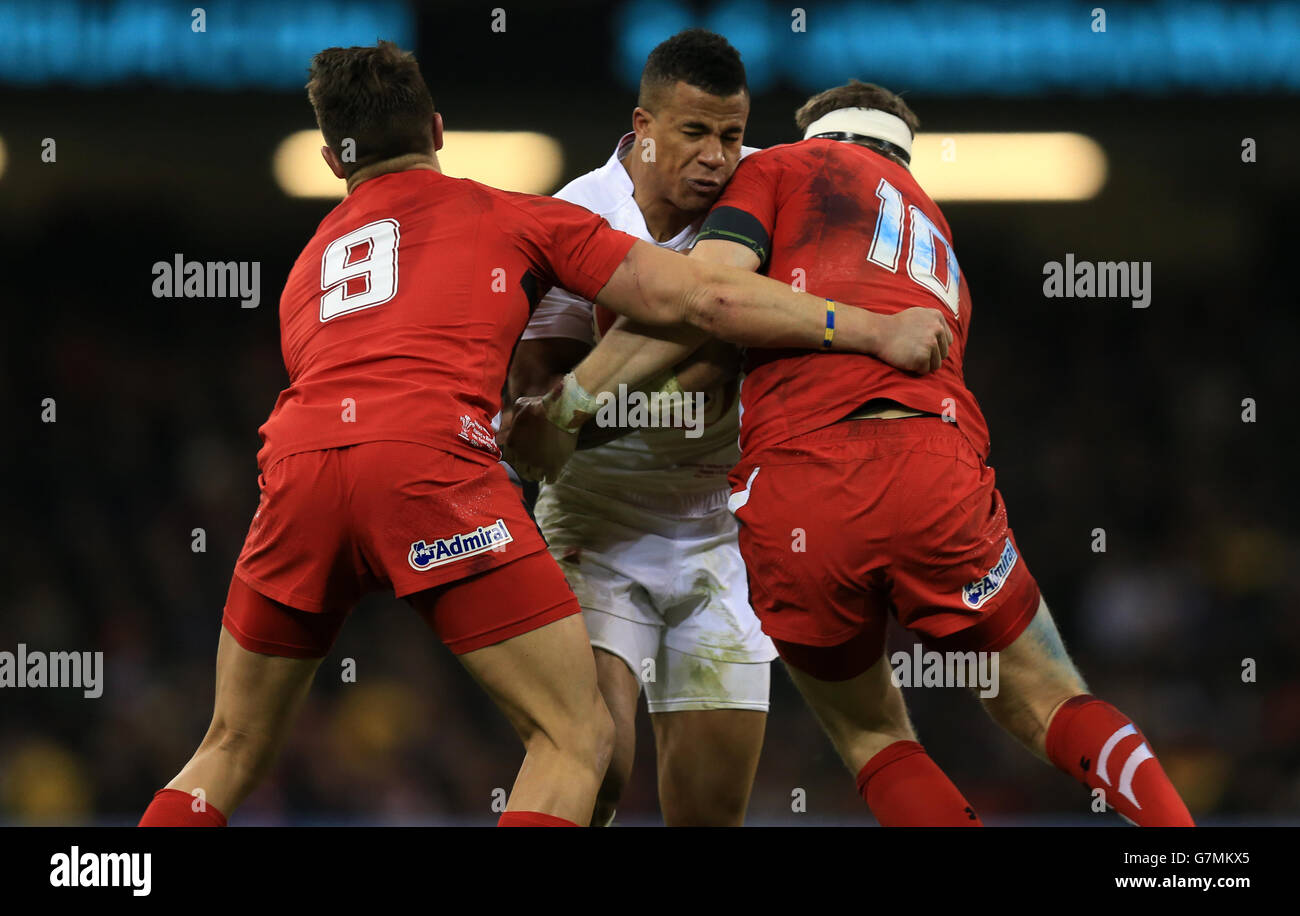 Wales rhys webb and dan biggar tackle englands anthony watson hi-res ...