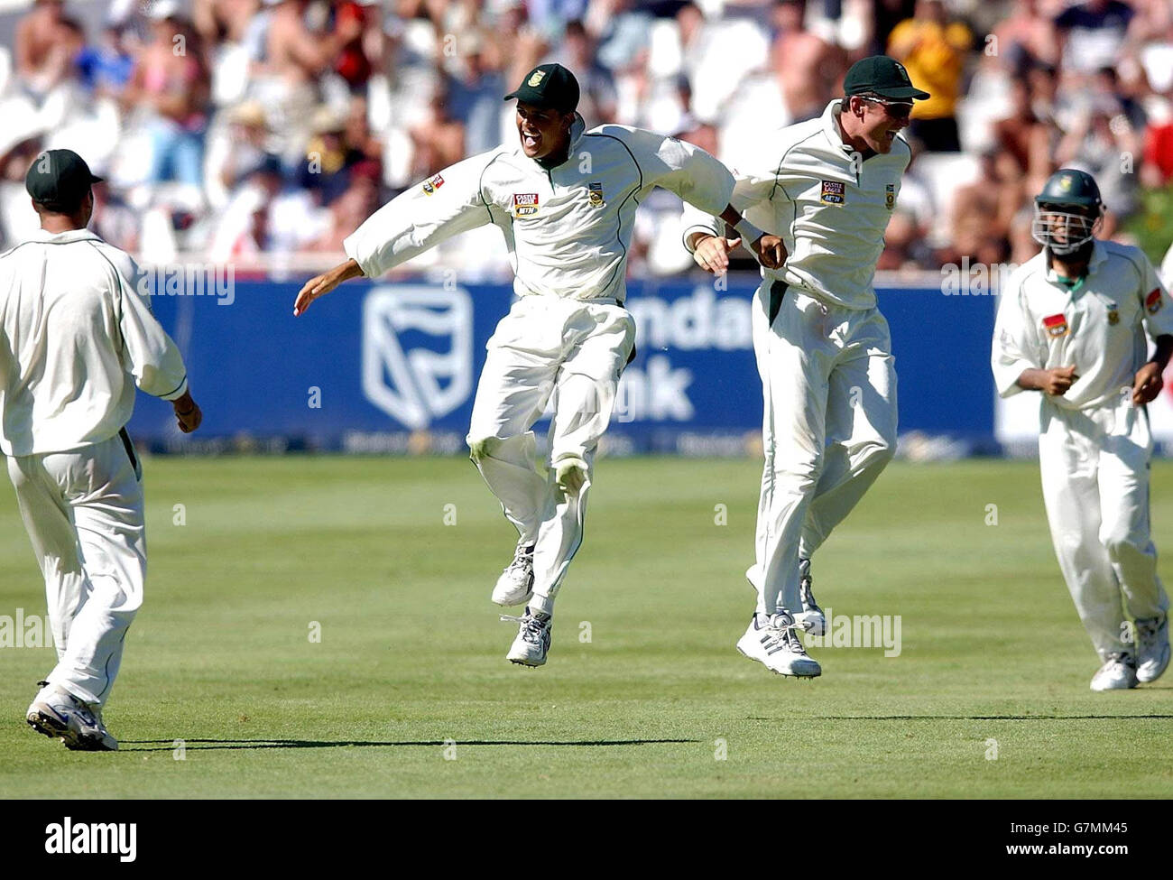 South Africa's Jacques Rudolph (centre left) and captain Graeme Smith ...
