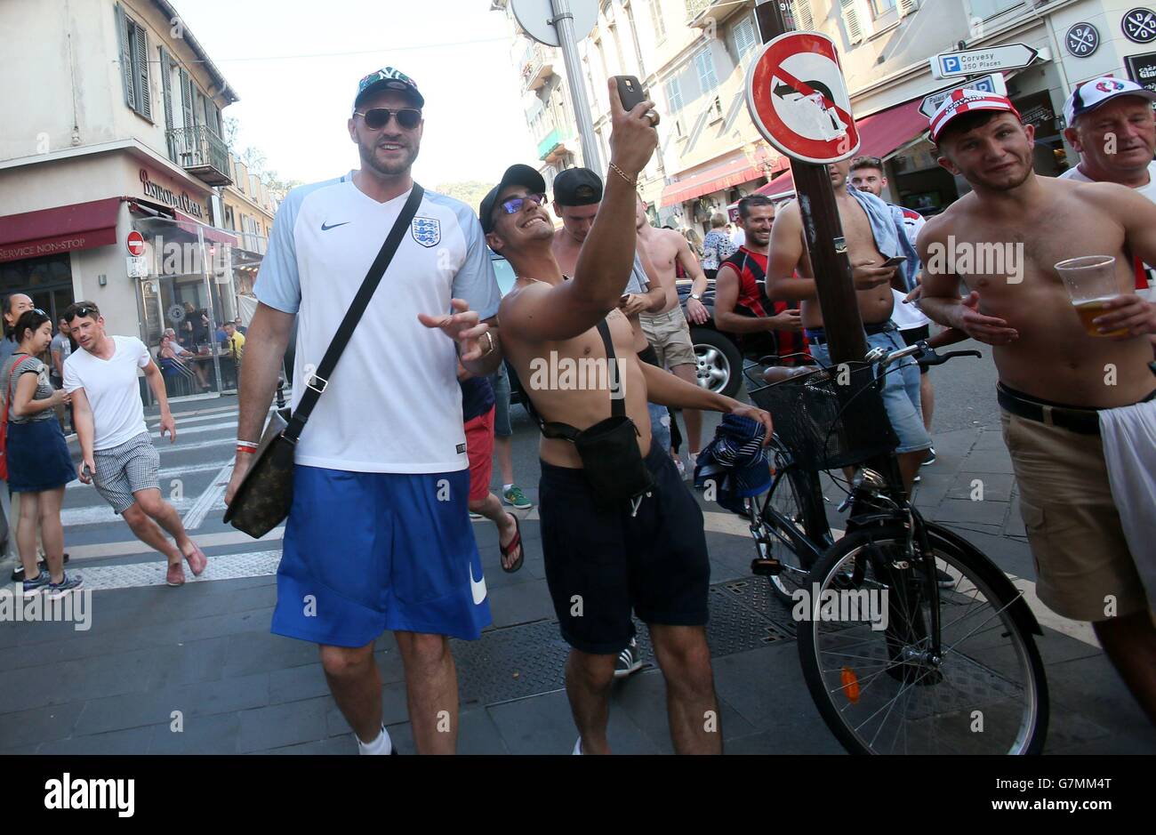 Boxer Tyson Fury (left) poses for pictures with England supporters in ...