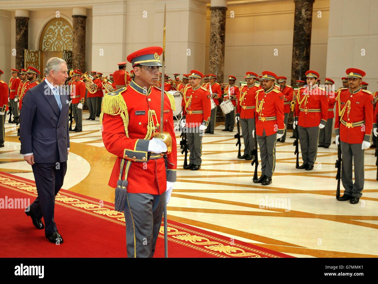 The Prince of Wales inspects a Guard of Honour after arriving at the ...