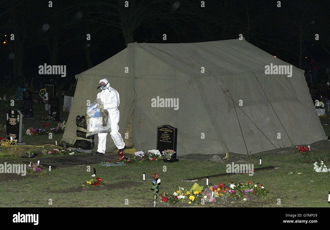 Tent forensics officer gravestone flowers hi-res stock photography and ...