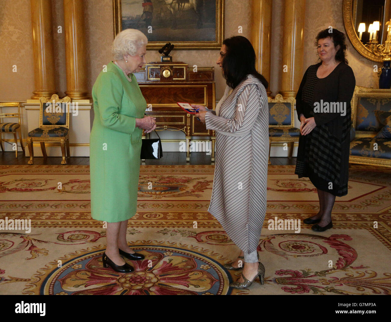 Queen Elizabeth II presents Imtiaz Dharker with The Queen's Gold Medal ...