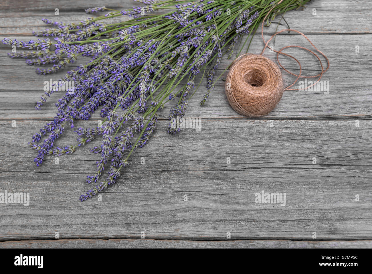 Bouquet of lavender and thread on a wooden table. Still life Stock ...