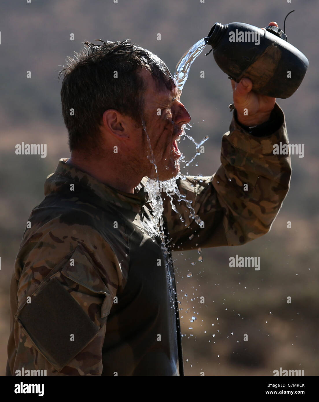 Sergeant james thomson from ayr cools down as soldiers from hi-res ...