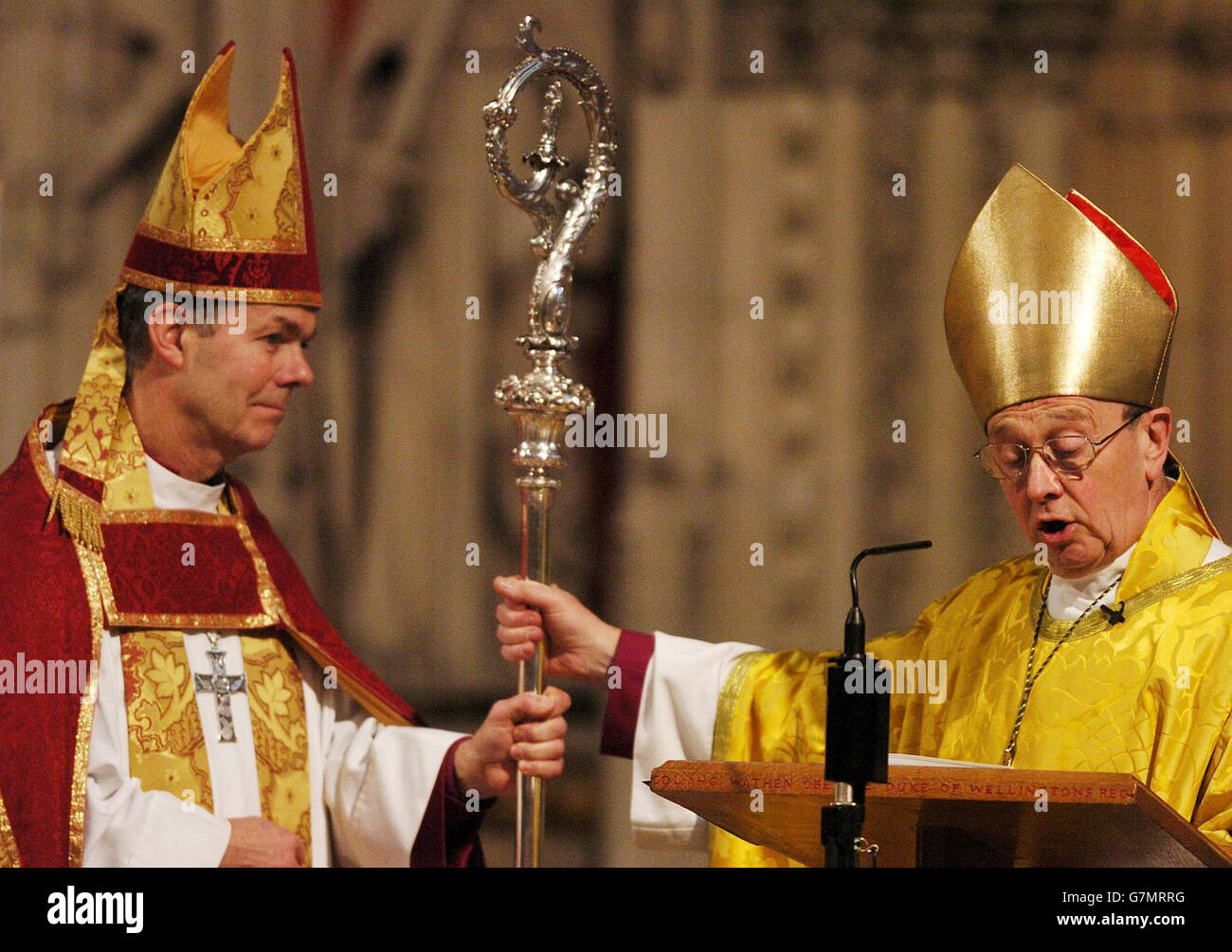 The Archbishop of York Dr David Hope (right) hands over his crozier to ...