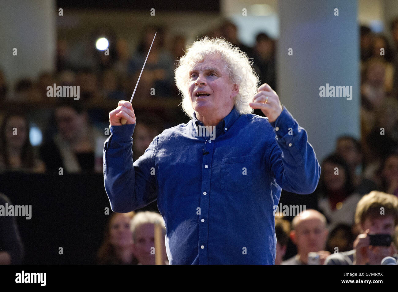 Sir Simon Rattle conducts the 100-piece Young Orchestra for London at ...