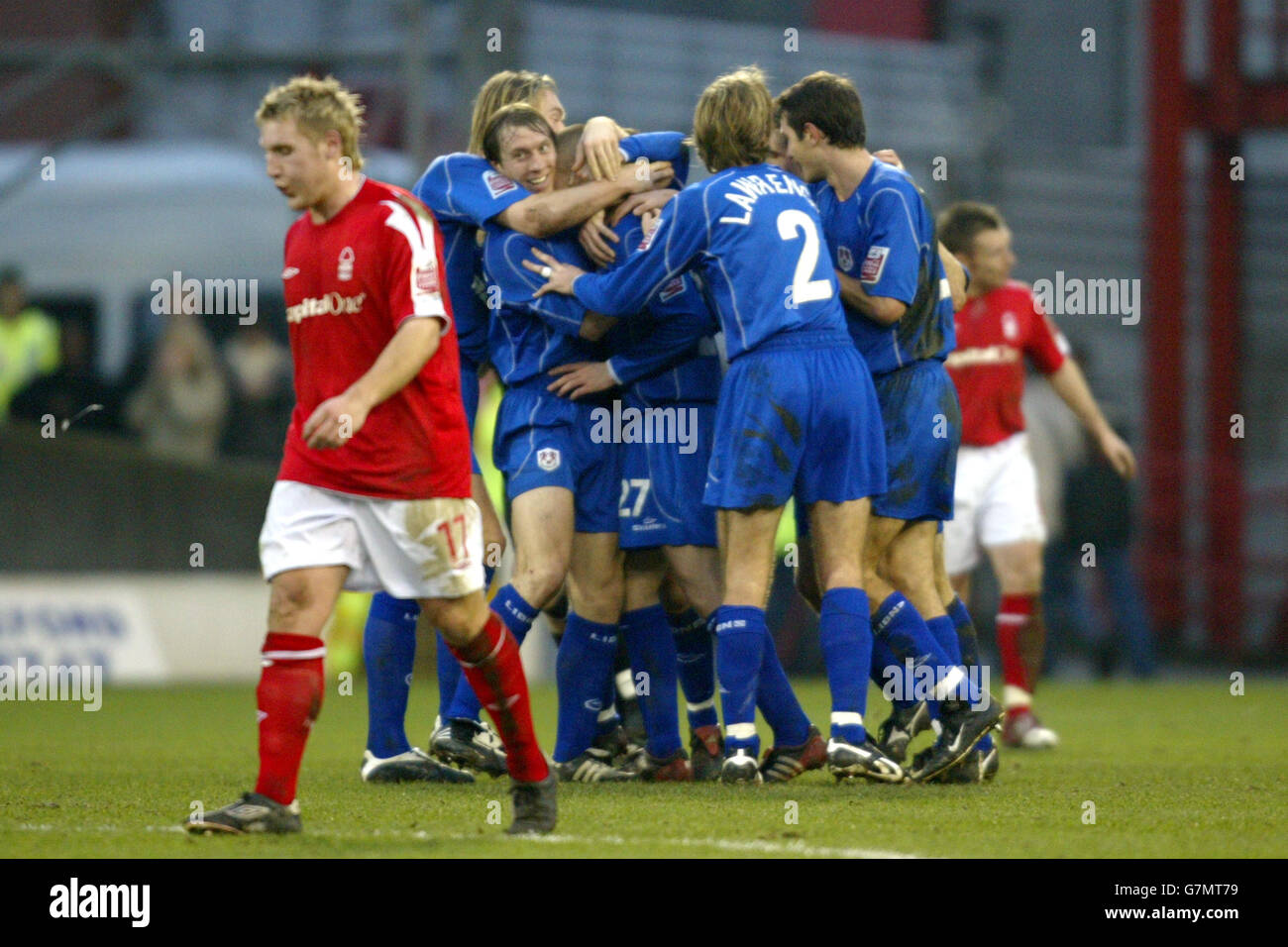 Millwall's Alan Dunne is mobbed by teammates as he celebrates scoring ...