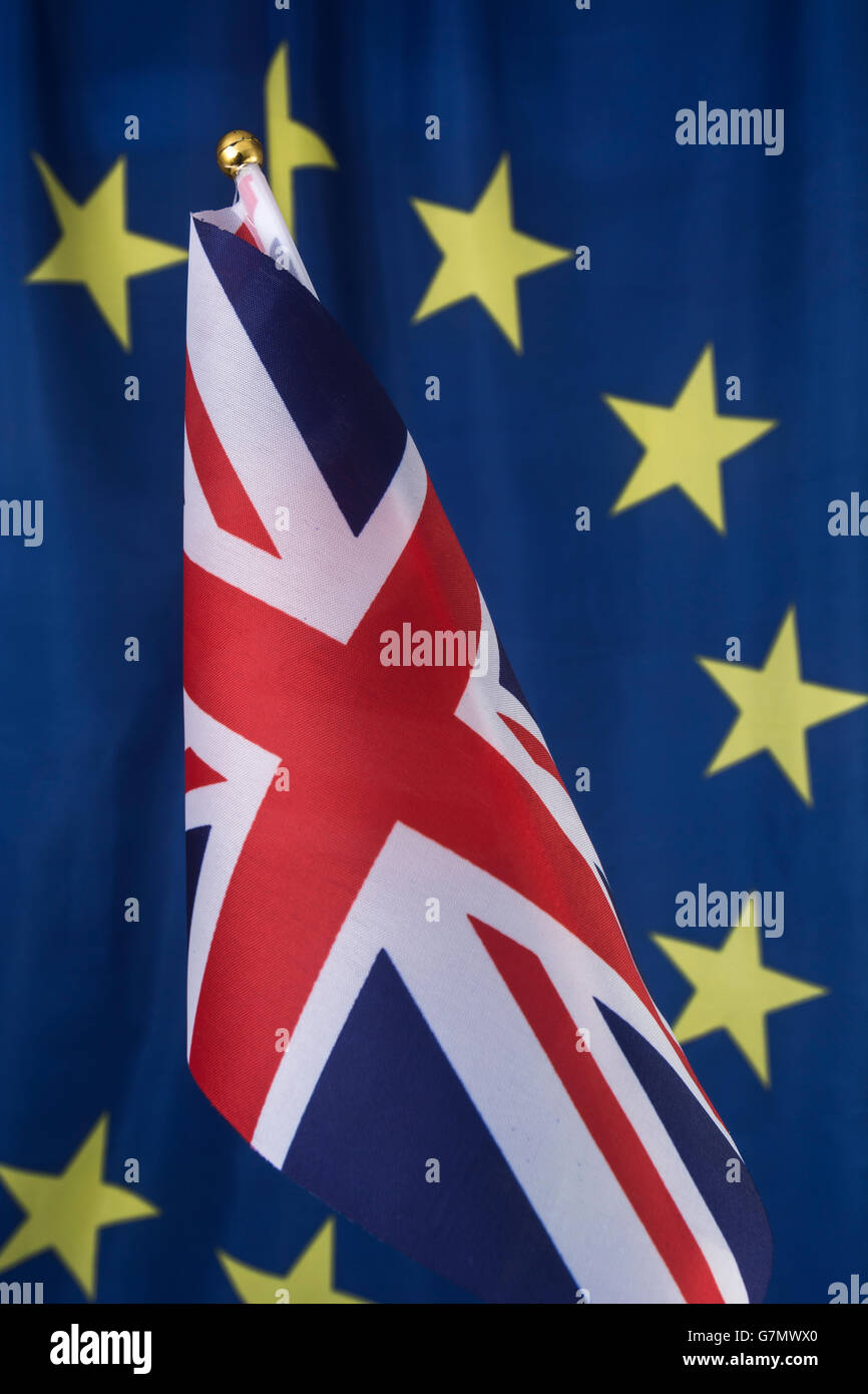 Brexit concept. Union Jack against crumpled EU European Community flag ...