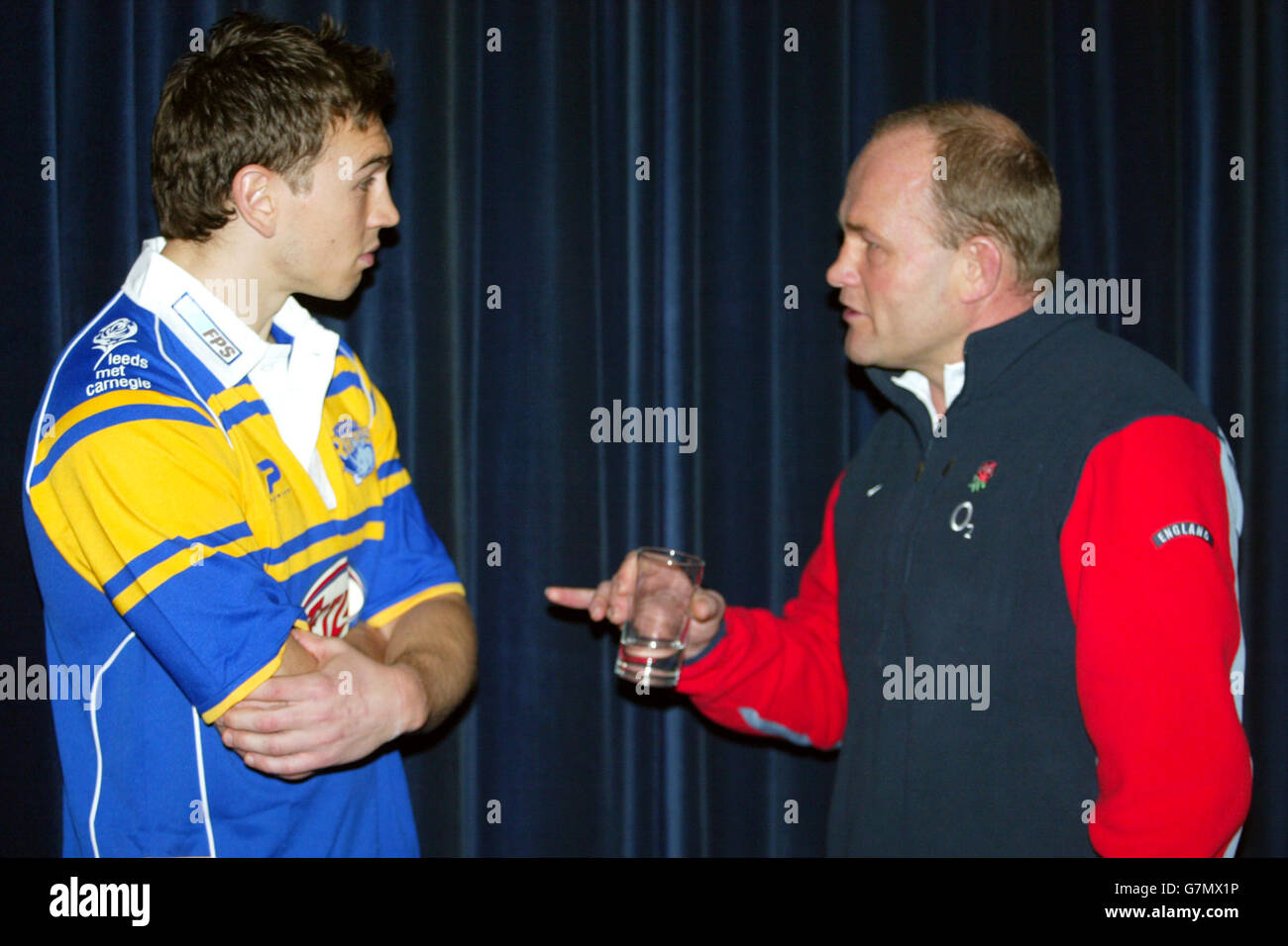 England rugby union coach Andy Robinson (R) talks to Leeds Rhinos rugby ...