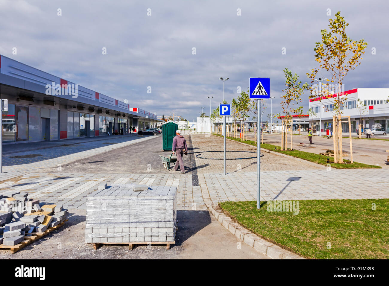 Blue rectangle traffic sign for the pedestrian crossing, building site ...