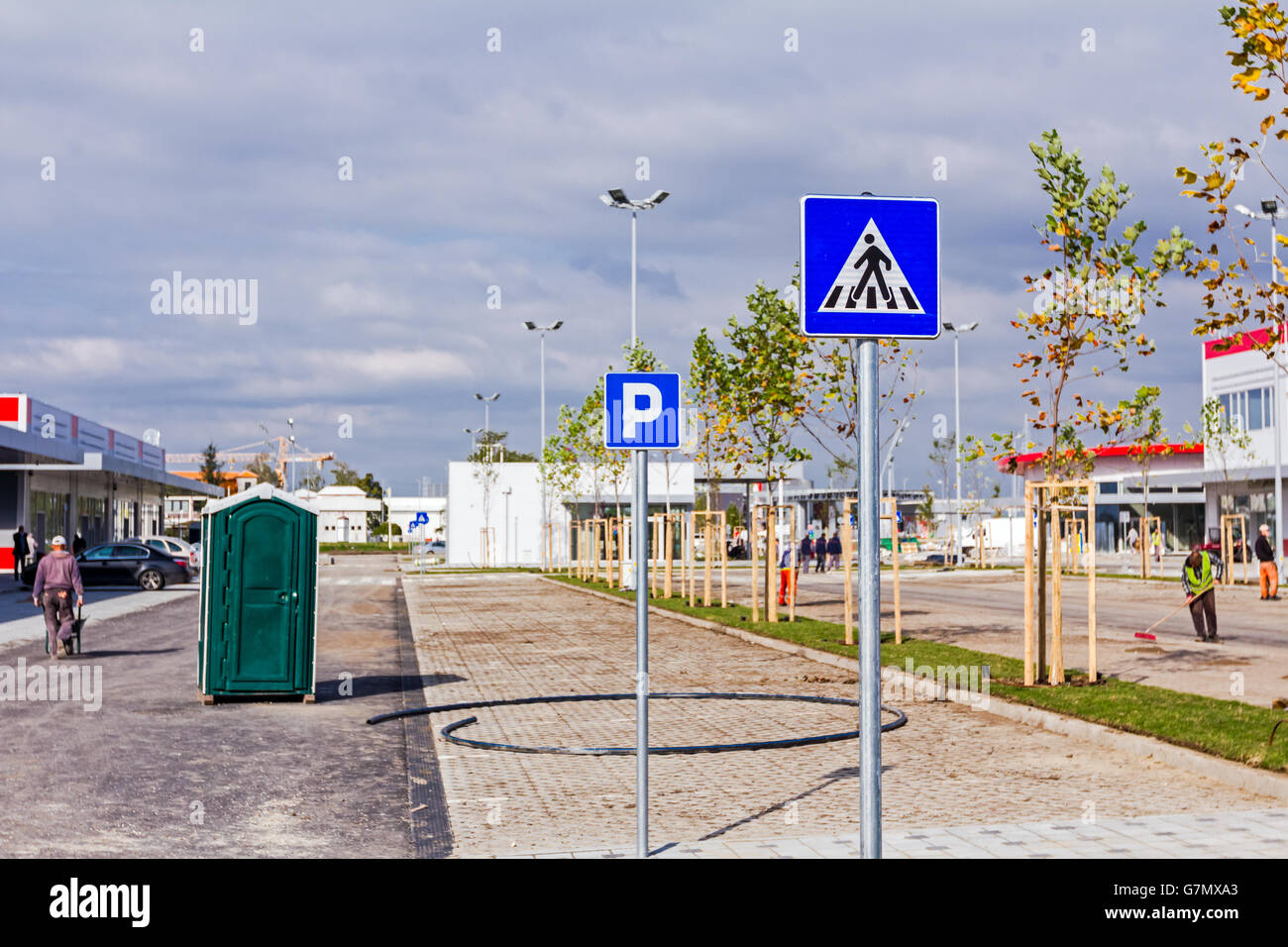 Blue rectangle traffic sign for the pedestrian crossing, building site ...