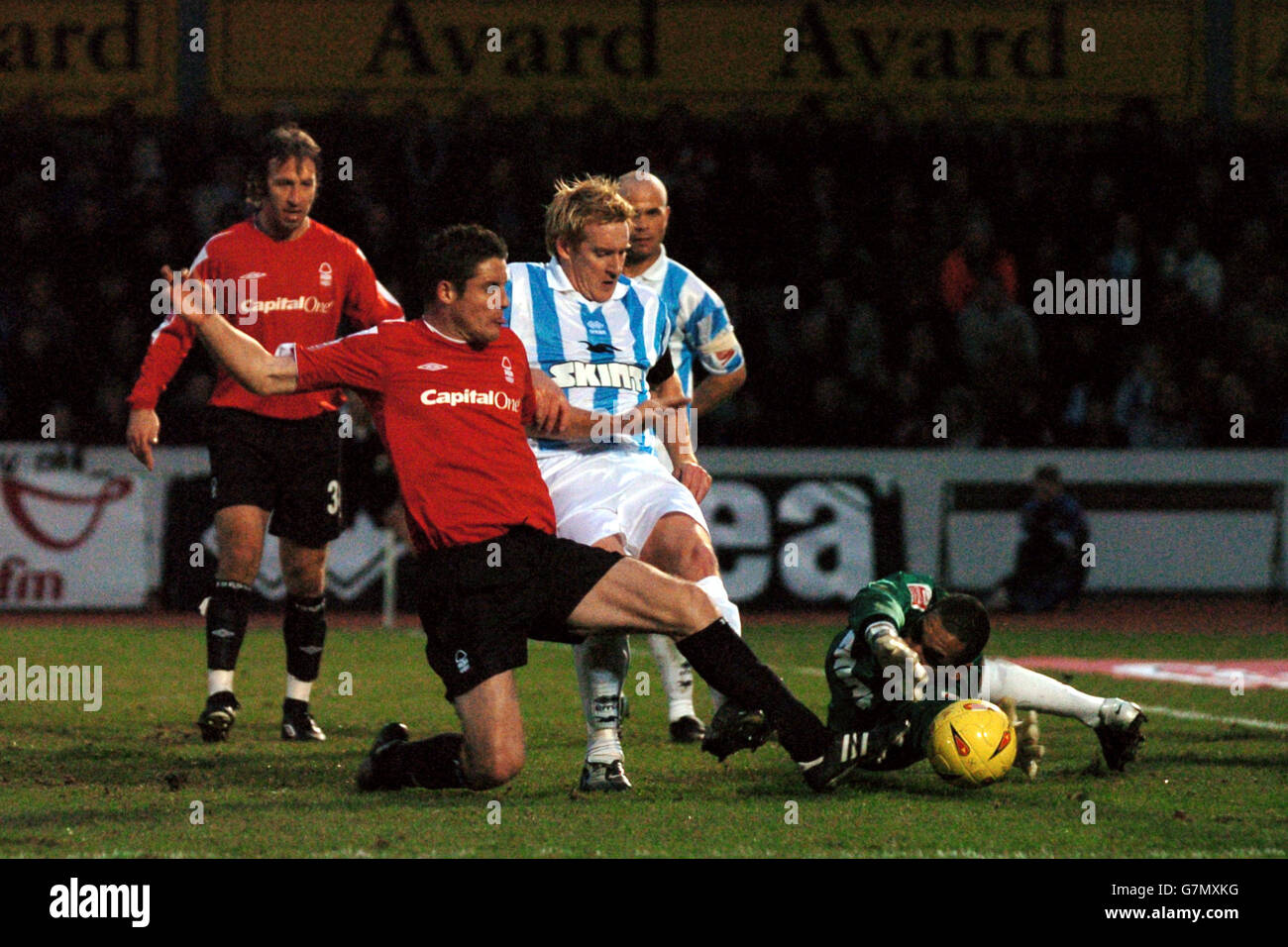 Brighton & Hove Albion's Michael Kuipers saves at the feet of ...