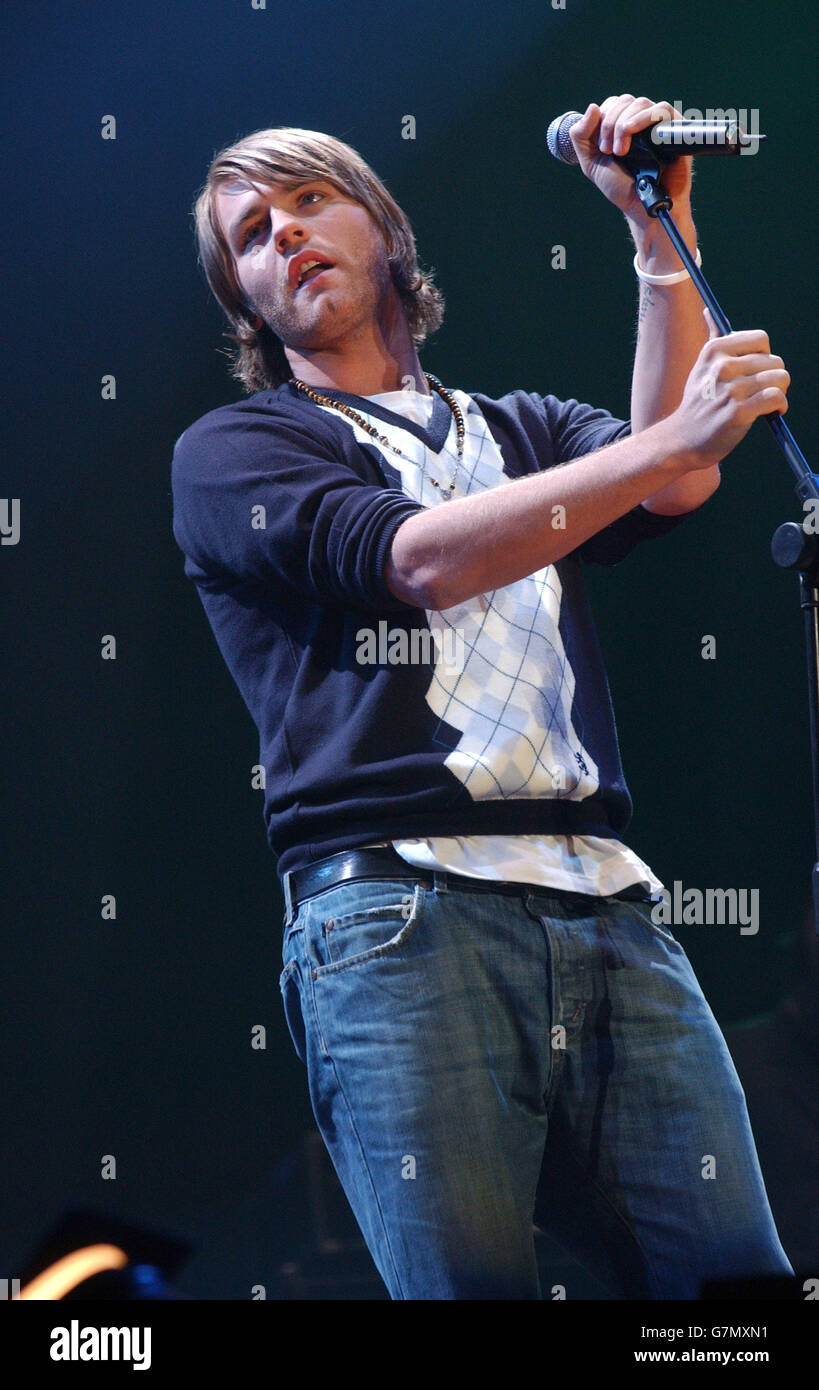 Charity performing on stage celebrity showbiz microphone hi-res stock ...