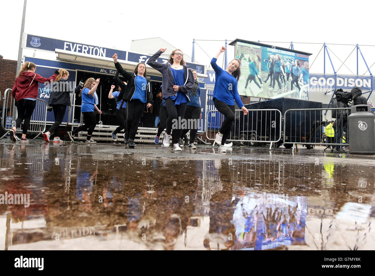 Wiked Kicks perform in the Everton fan zone before kick-off Stock Photo ...