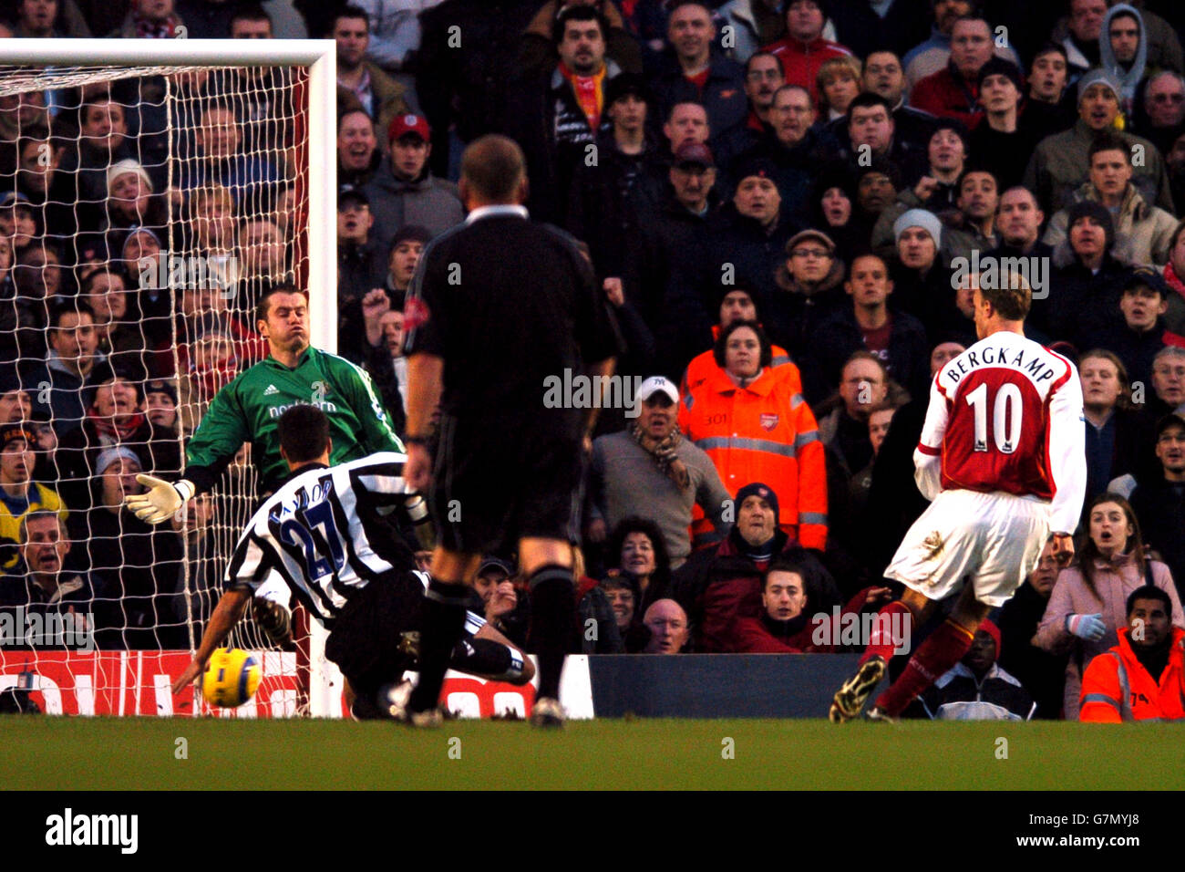 Arsenal's Dennis Bergkamp scores their opening goal of the game past ...