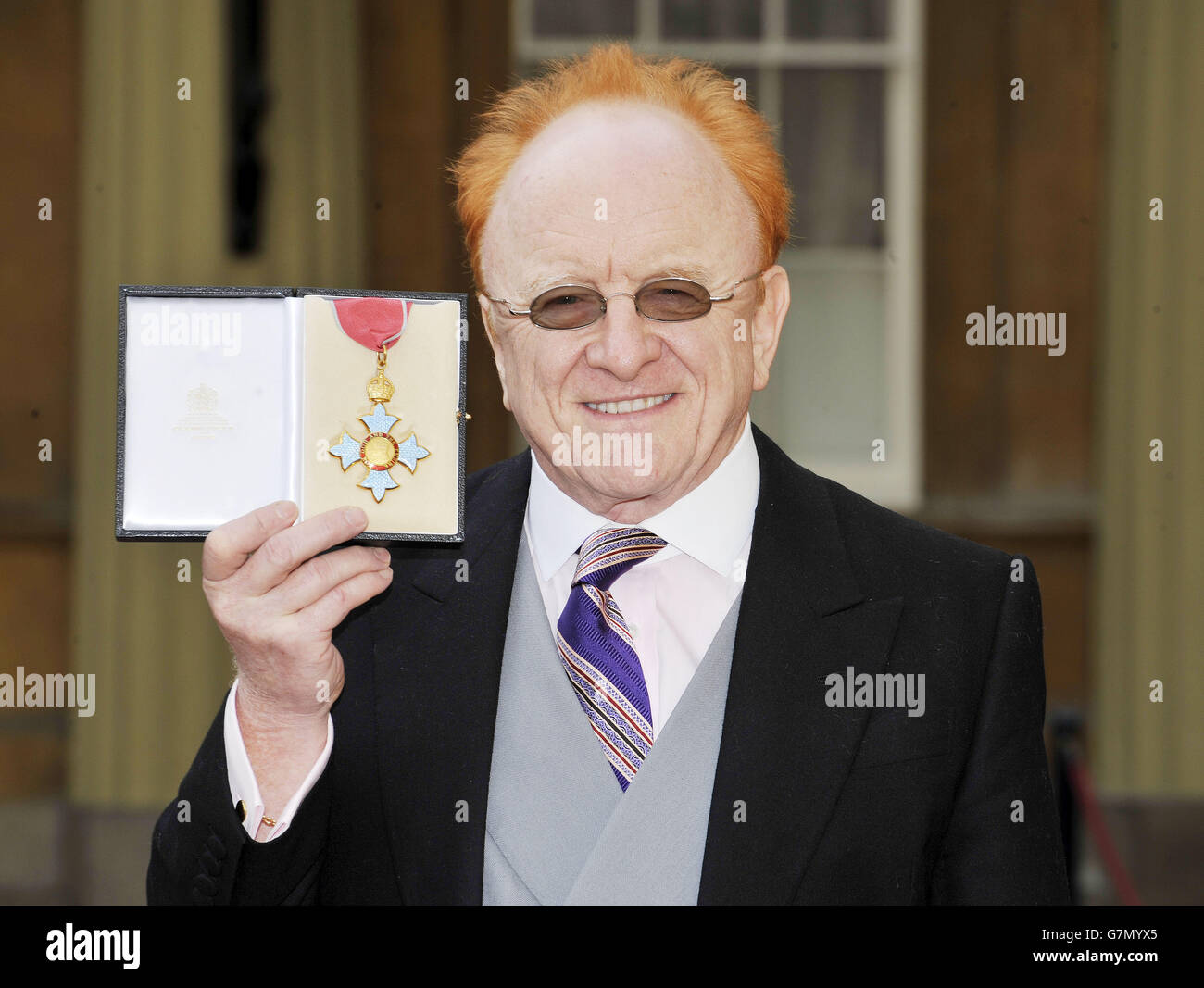 Musician, manager and record producer Peter Asher holds his Commander ...