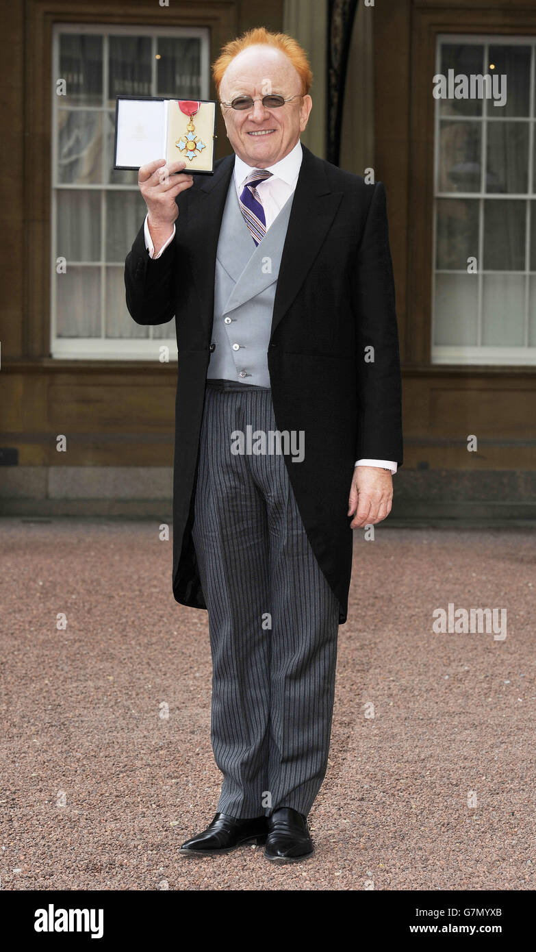 Musician, manager and record producer Peter Asher, holds his Commander ...
