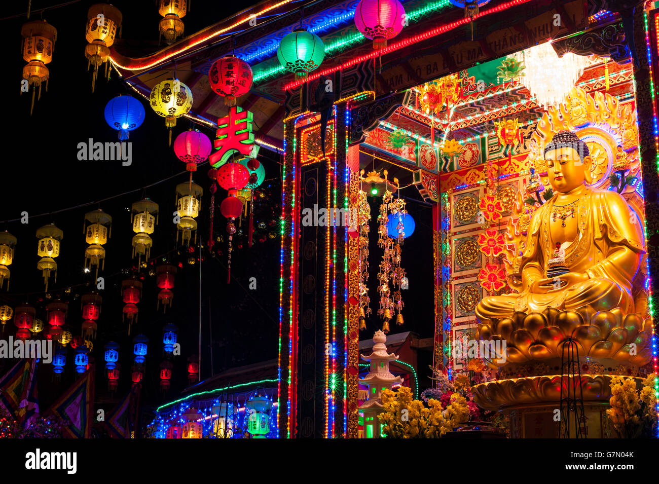 Multicolored lights leading the way to Buddhist Temples Stock Photo - Alamy