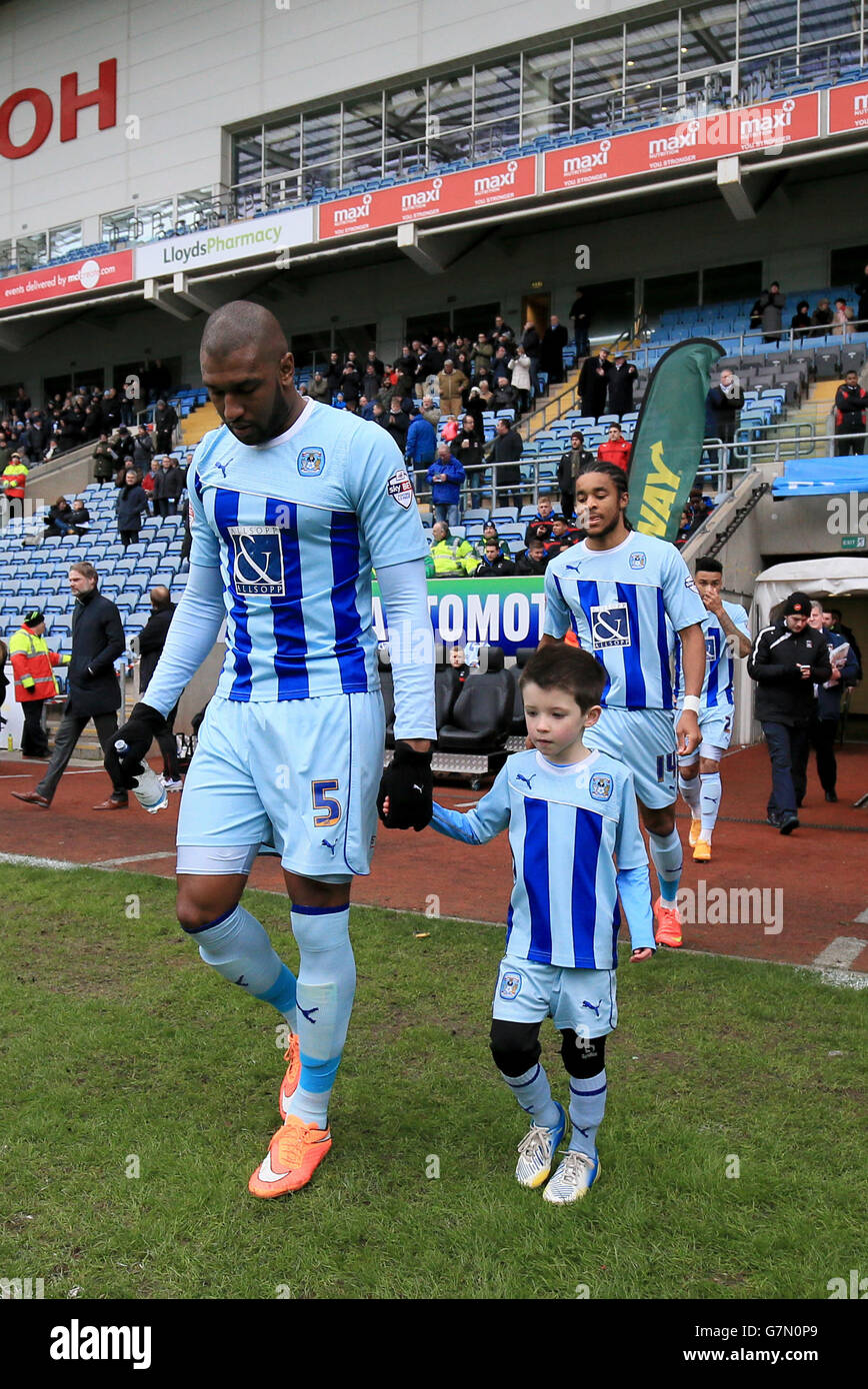 Coventry citys reda johnson walks onto the pitch with hi-res stock ...