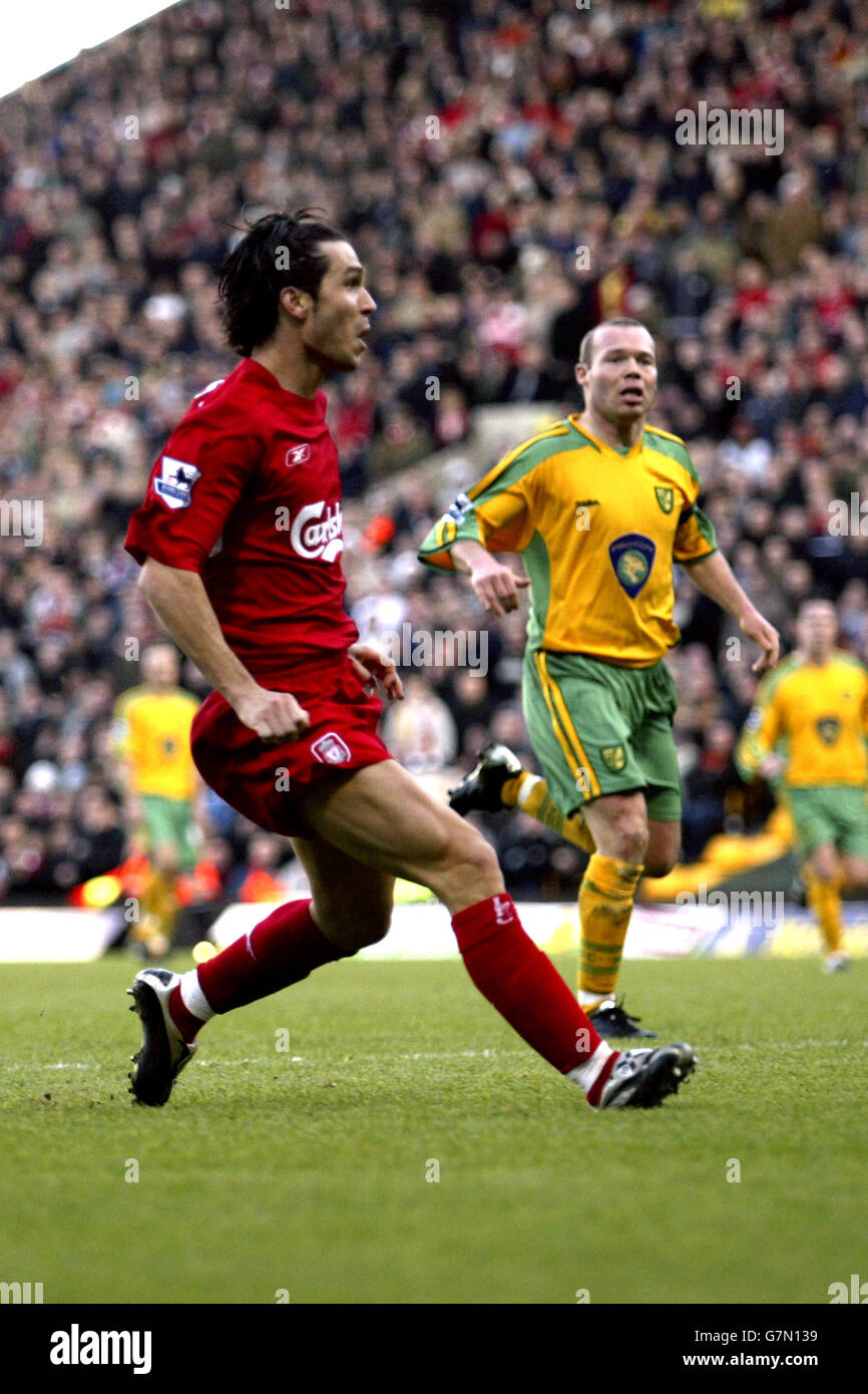 Norwich City's Simon Charlton can stands helpless as Liverpool's Luis ...