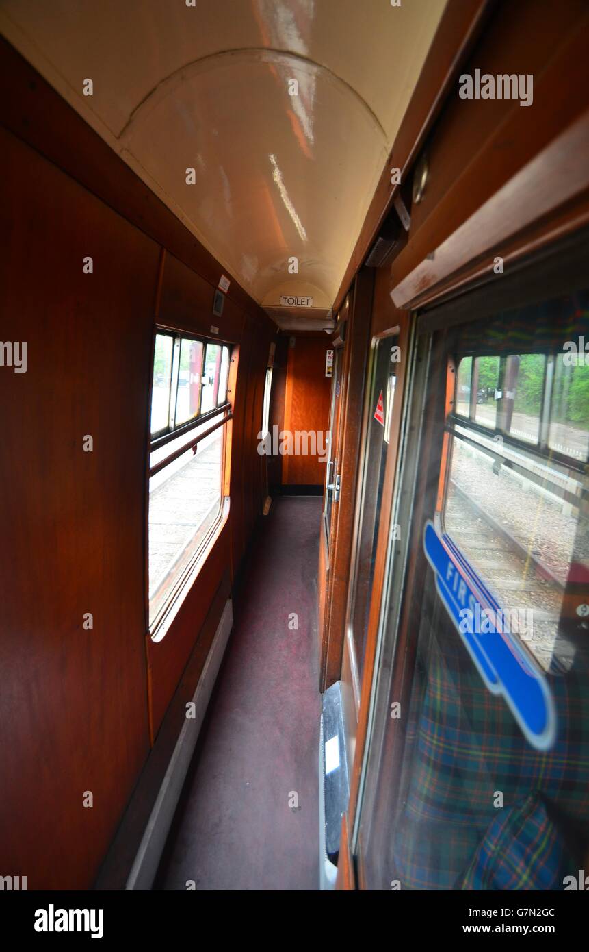 Corridor inside a vintage steam train carriage on the Strathspey steam ...
