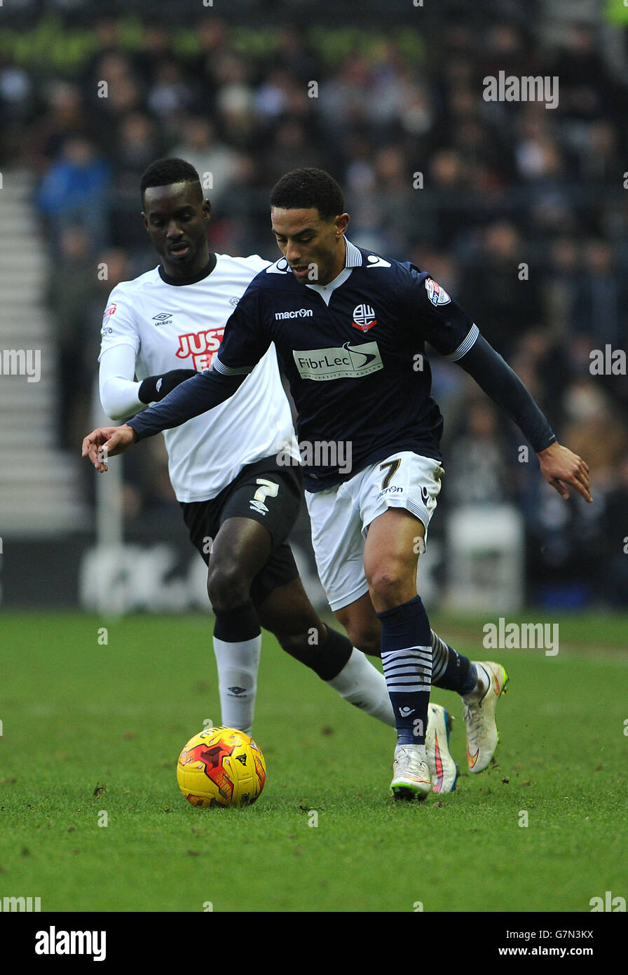 Derby County's Simon Dawkins (left) challenges Bolton's Liam Feeney ...