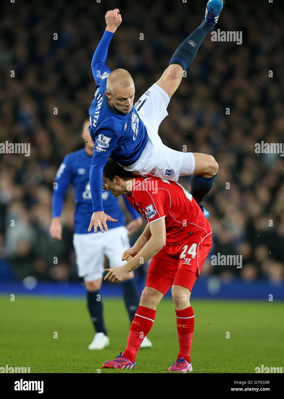 Everton's Steven Naismith (left) and Liverpool's Joe Allen collide ...