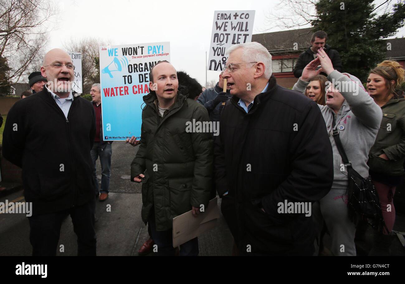 (left to right) Socialist Cllr Mick Murphy, TD Paul Murphy and TD Joe ...