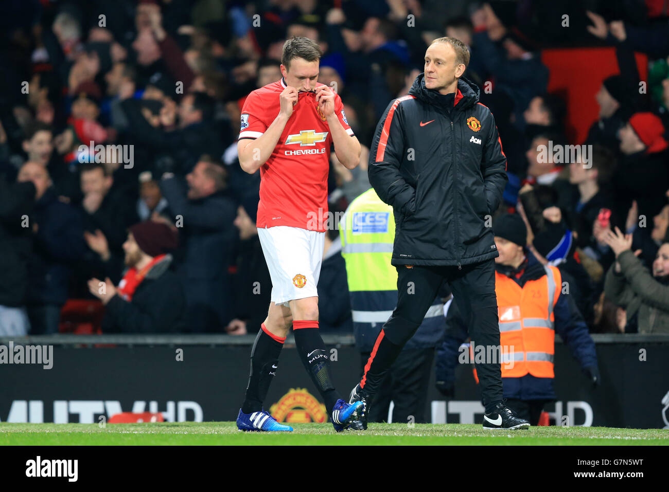 Manchester United's Phil Jones has to leave the pitch due to injury ...