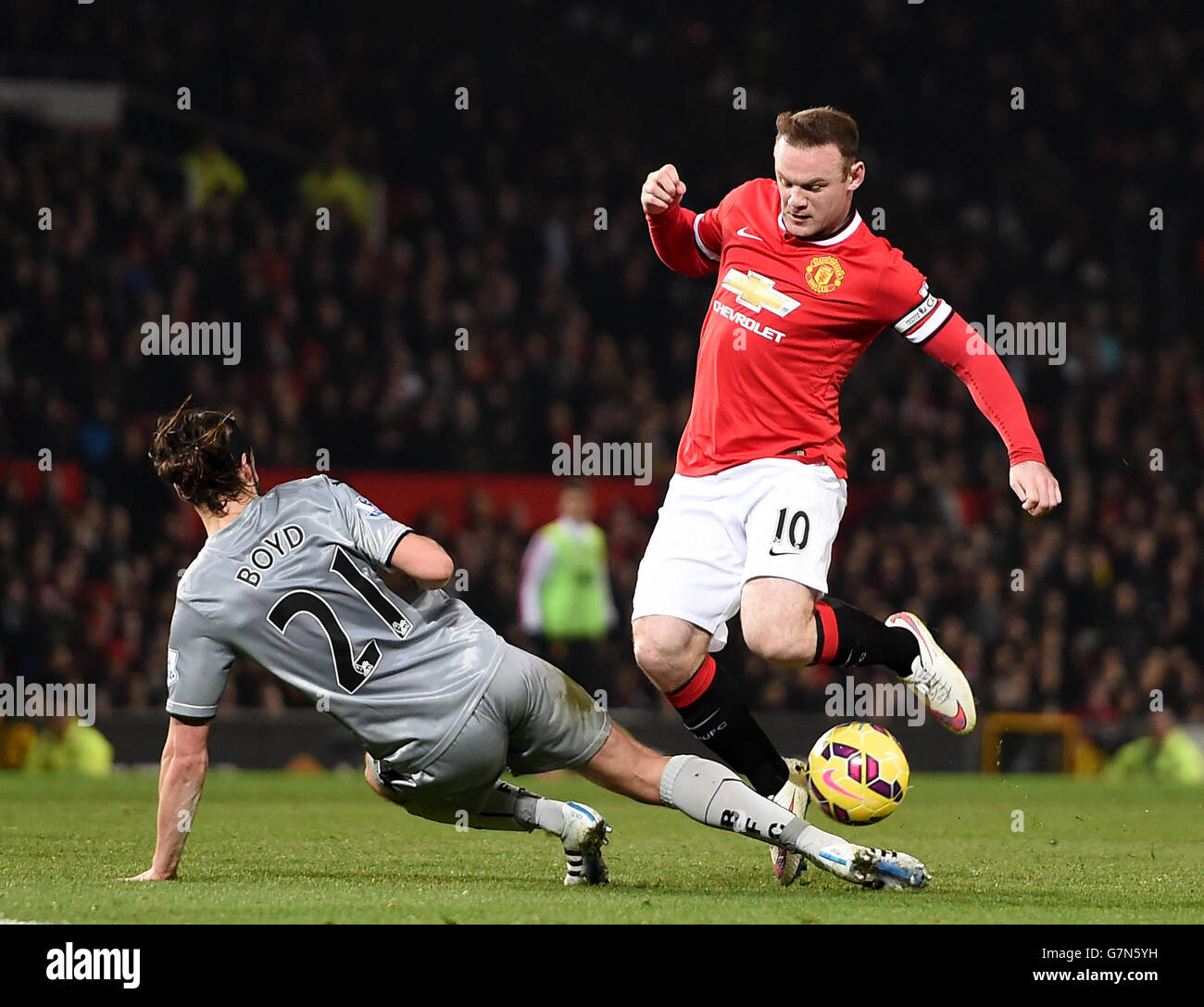 Manchester United's Wayne Rooney (right) and Burnley's George Boyd ...