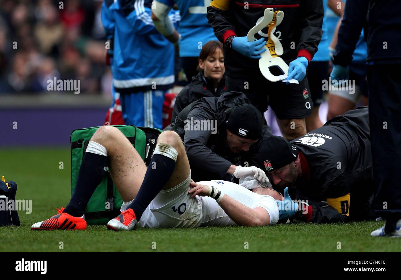 England's Mike Brown receives treatment for an injury during the 6 ...