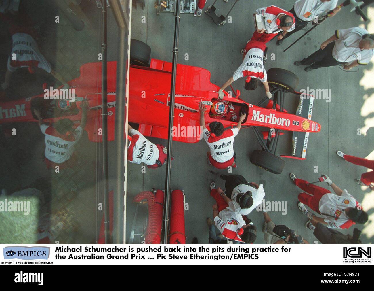 Motor Racing ... Australian Grand Prix. Michael Schumacher is pushed ...