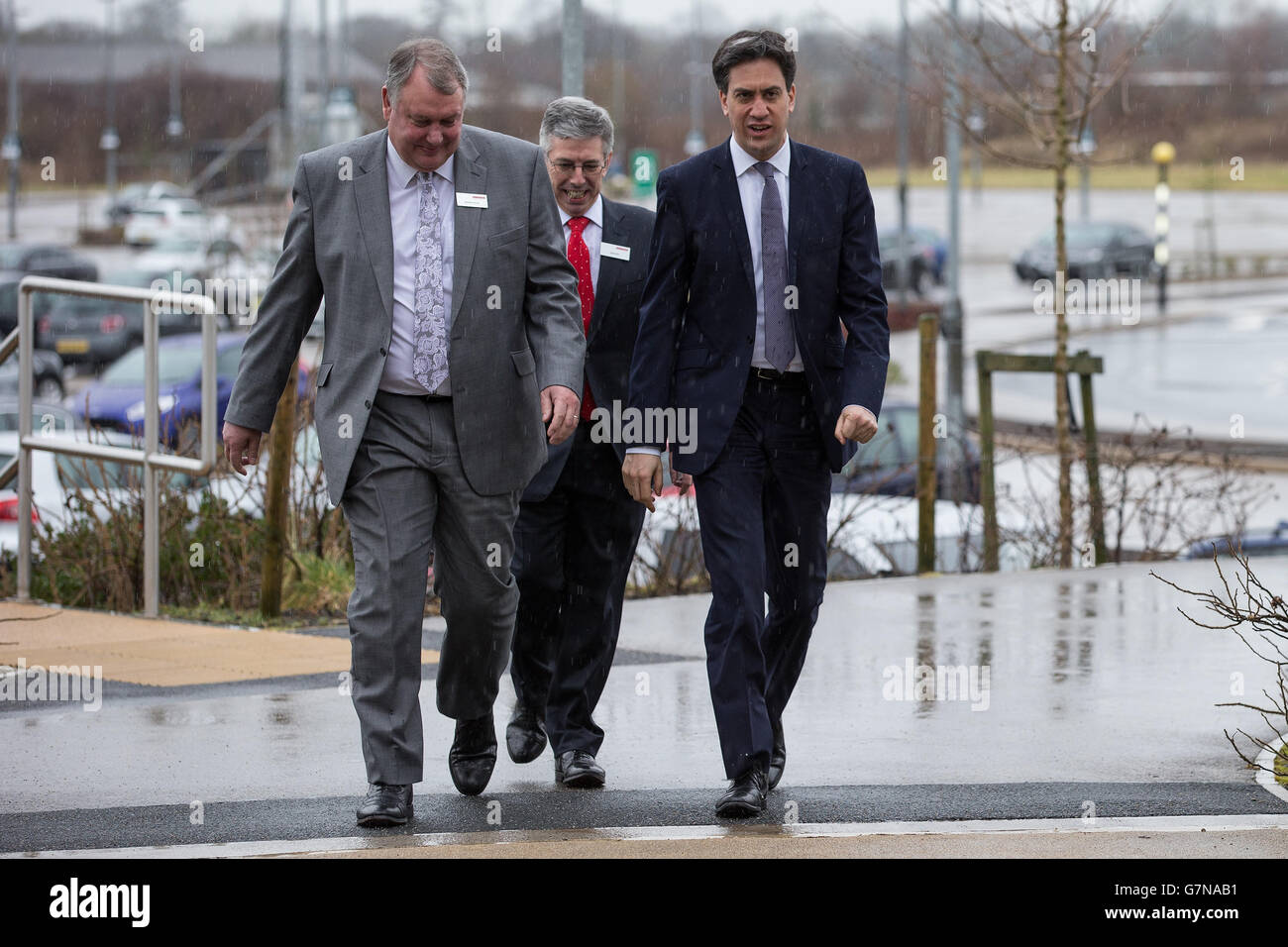 Labour leader Ed Miliband (right) arrives or a visit to BAE Systems in ...
