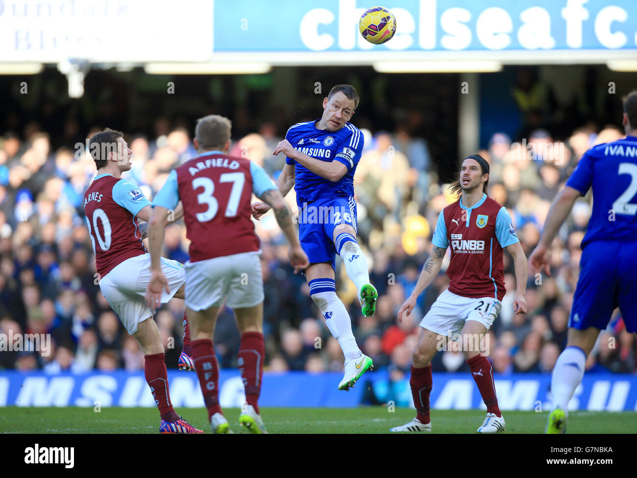 Chelsea's John Terry heads the ball clear during the Barclays Premier ...