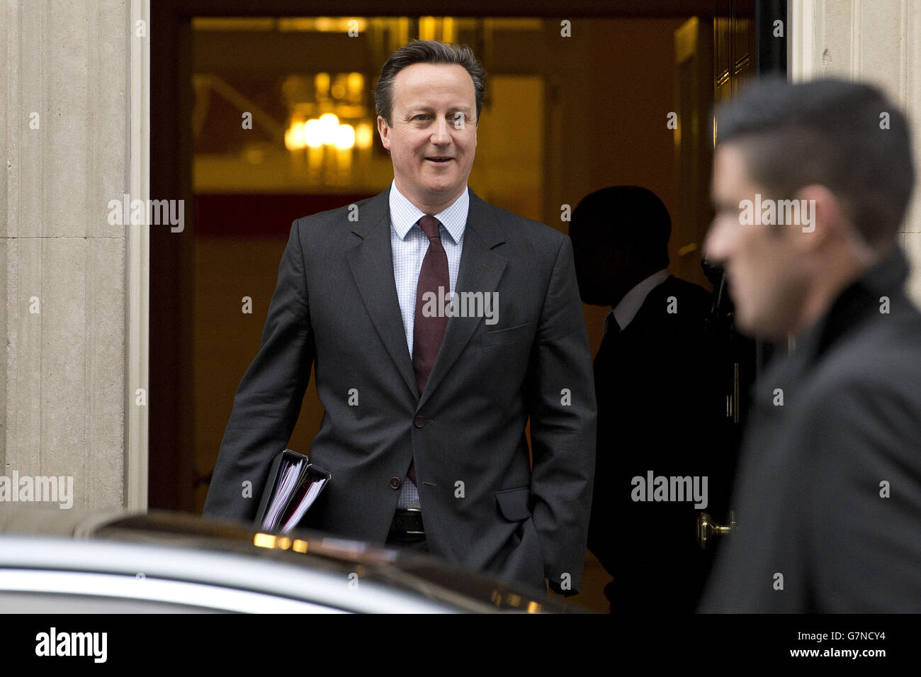 Prime Minister David Cameron leaves 10 Downing Street before he appears ...