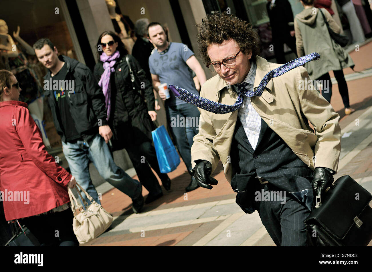 Windswept man, a street artist performer in Grafton Street in the city ...