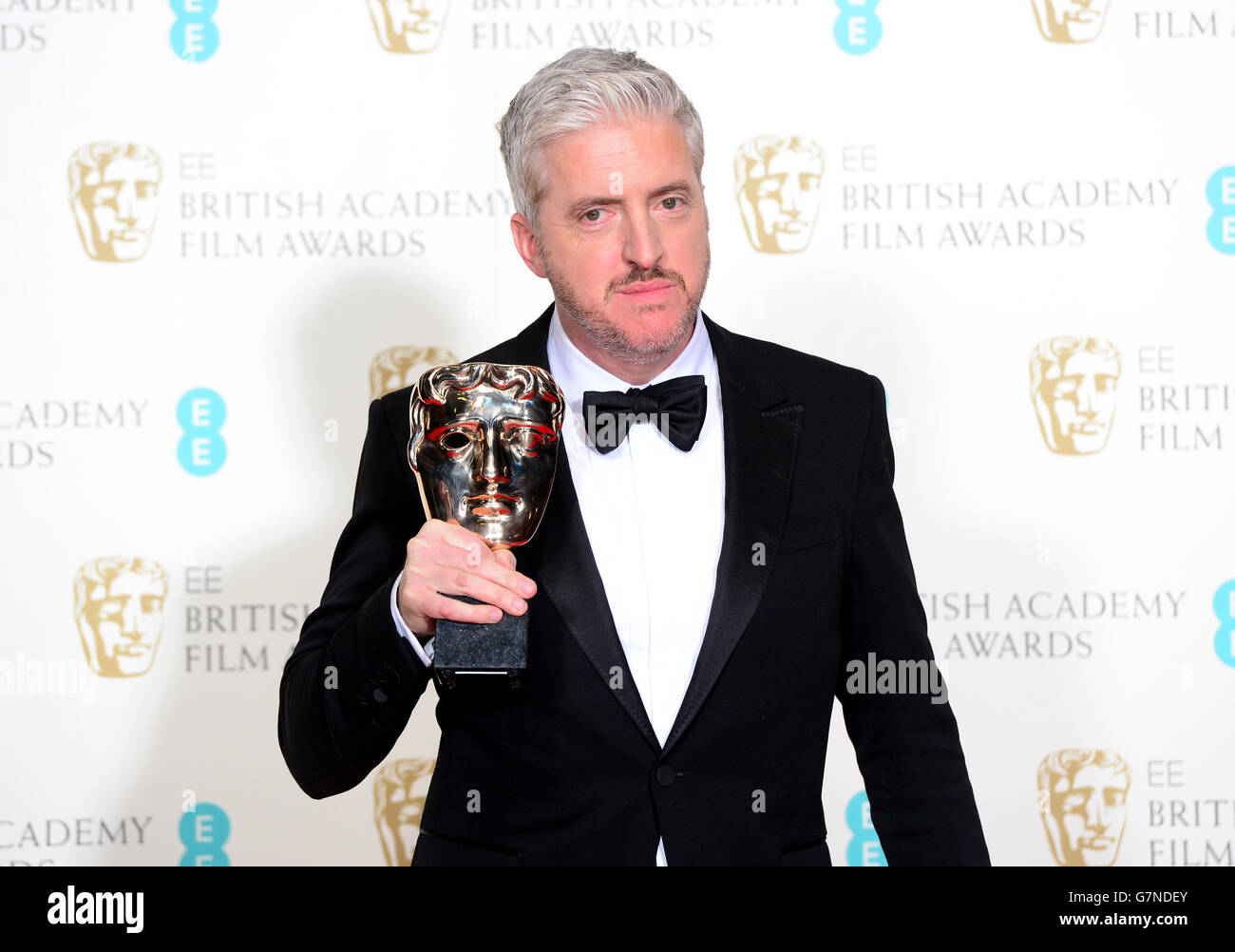Anthony McCarten with the Adapted Screenplay Award for The Theory of ...