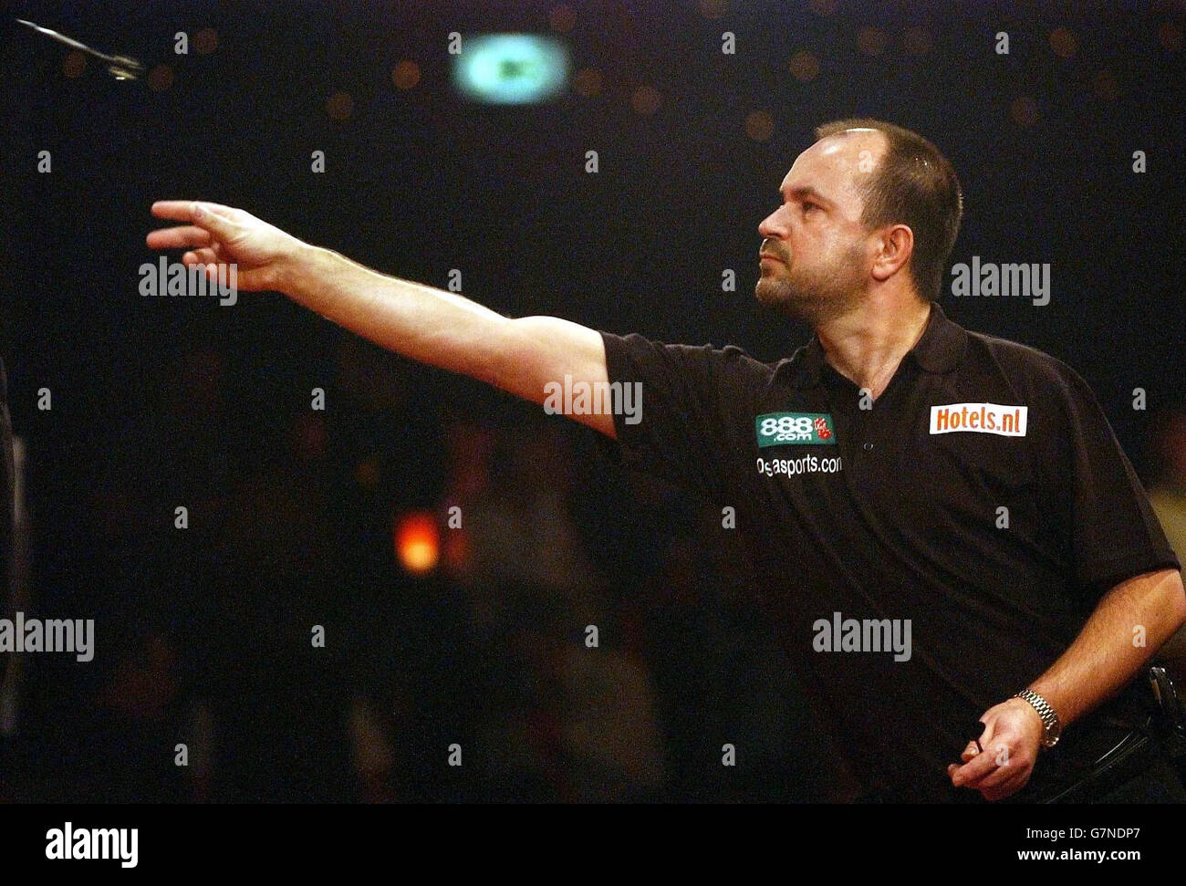 Andre Brantjes throws his darts against Simon Whitlock in the quarter ...