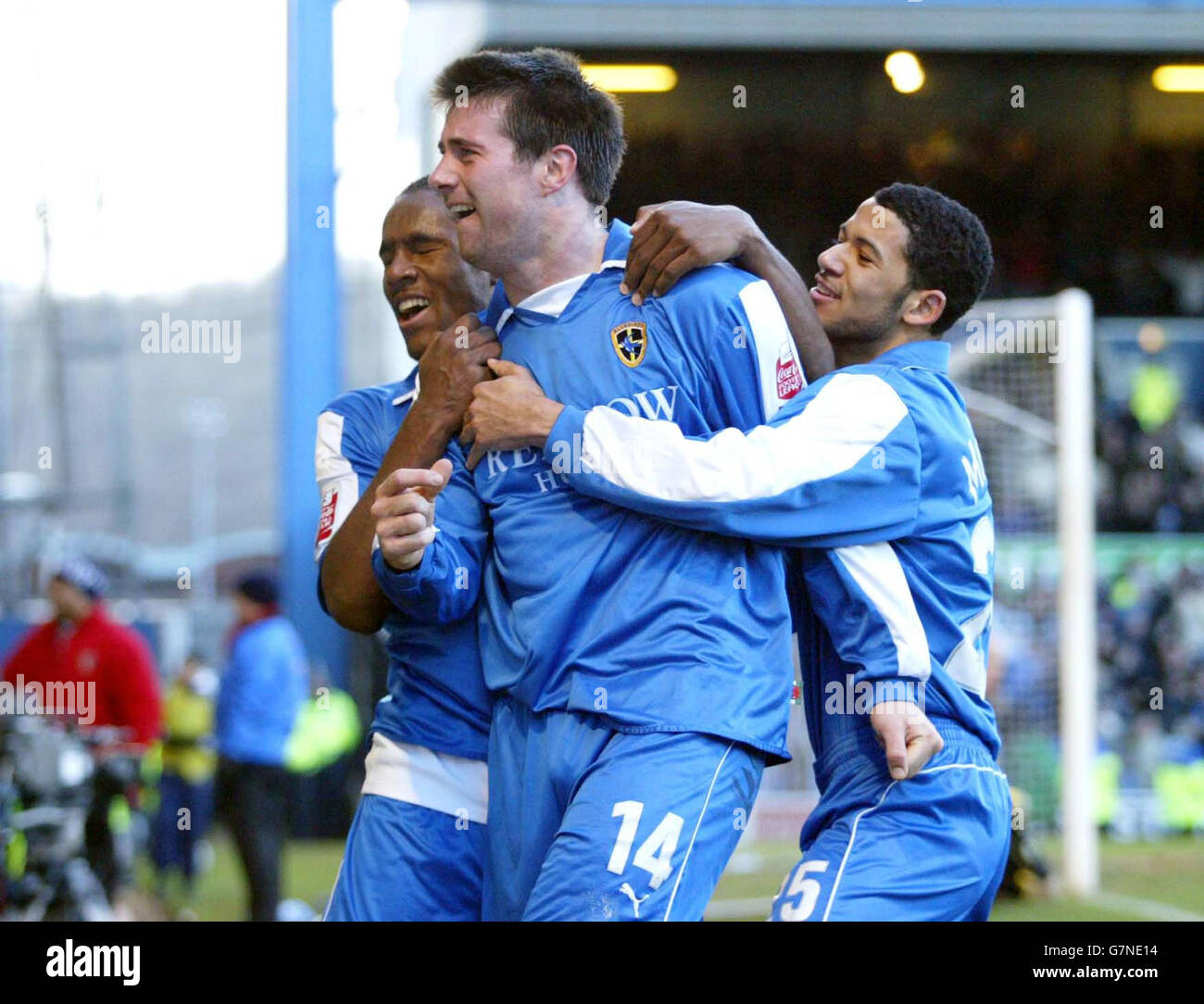 Cardiff's goalscorer Alan Lee (centre) celebrates with Cameron Jerome ...