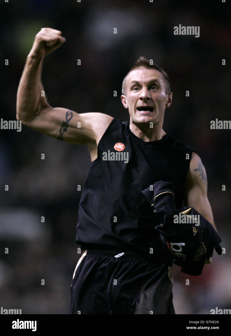 Exeter City captain Sean Devine celebrates after drawing with ...