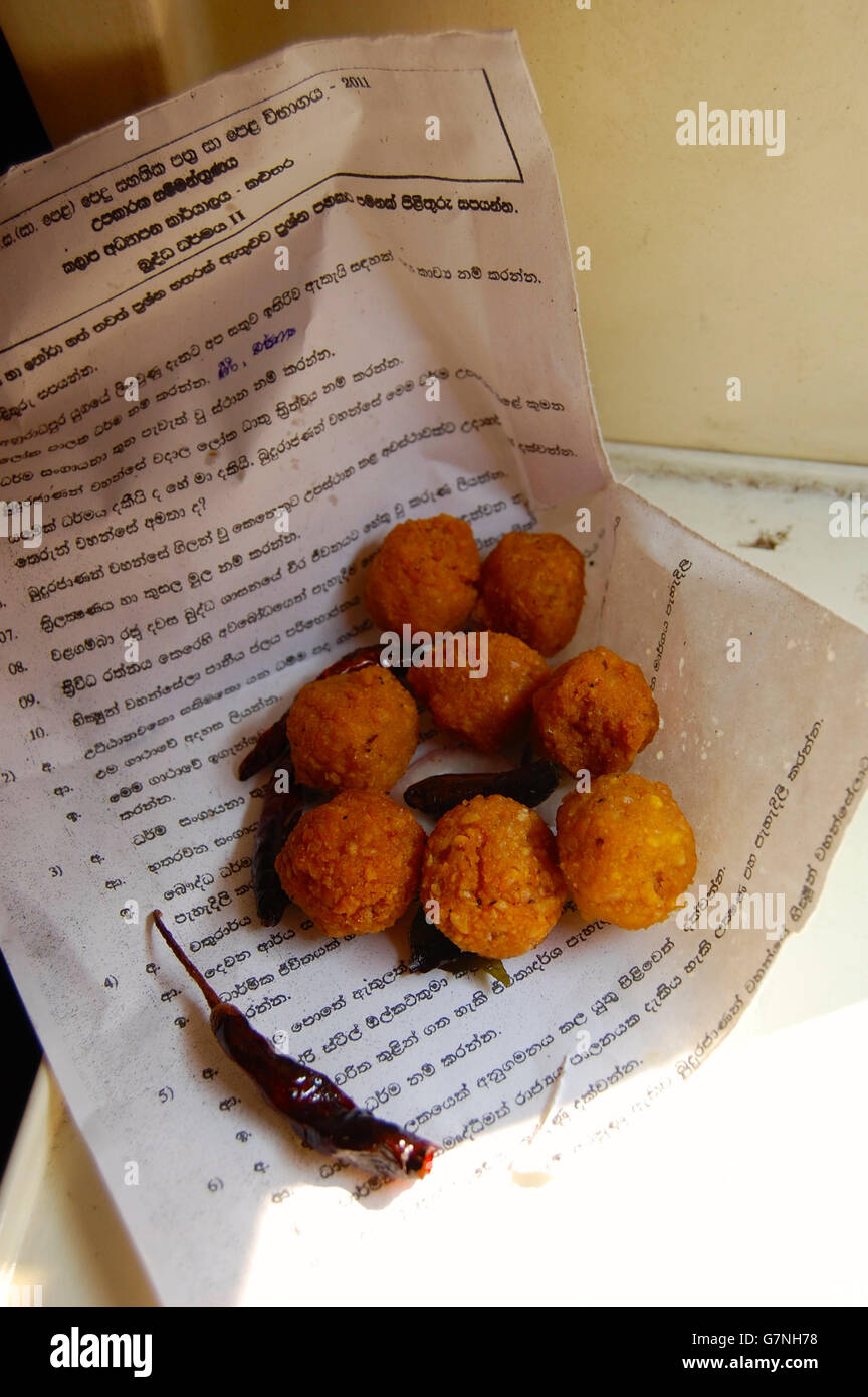 a snack of fried chick pea balls on a train in sri lanka Stock Photo ...