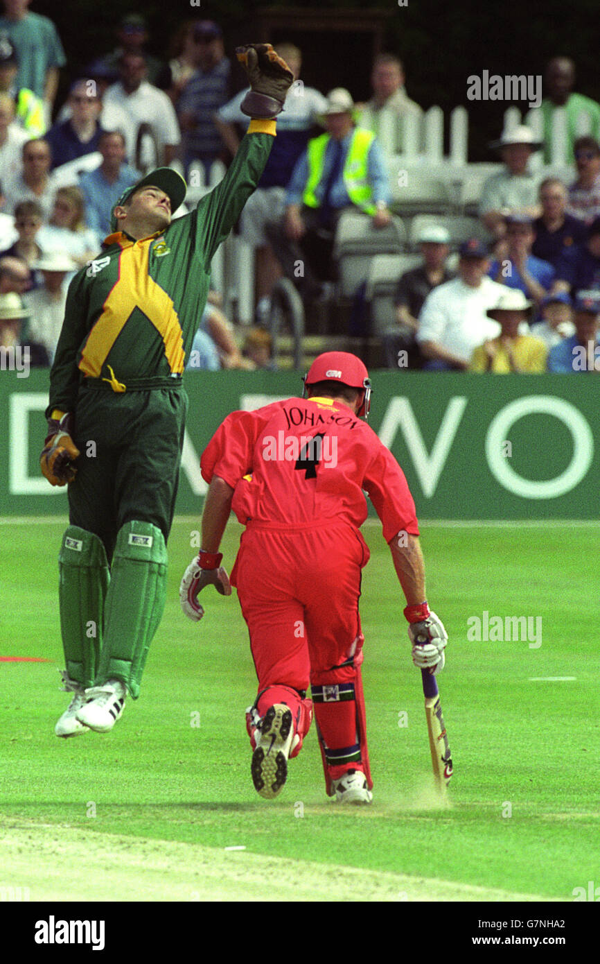 Zimbabwe's Neil Johnson makes it to the crease as South Africa's ...