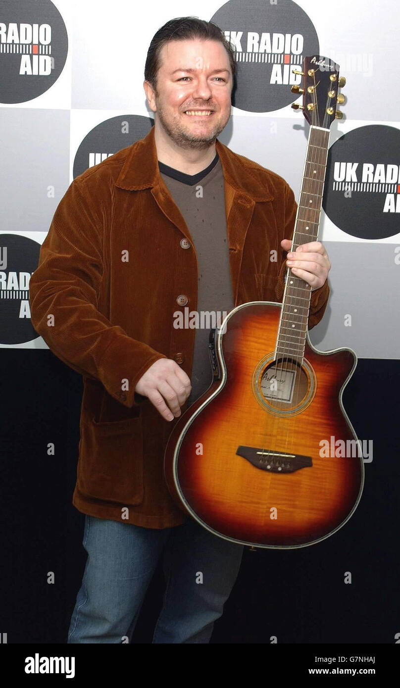 Ricky Gervais and his guitar arriving to take part in a 268 station, 12 ...