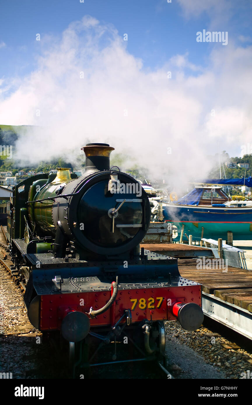 An old steam train, with bellowing steam Devon England Stock Photo - Alamy