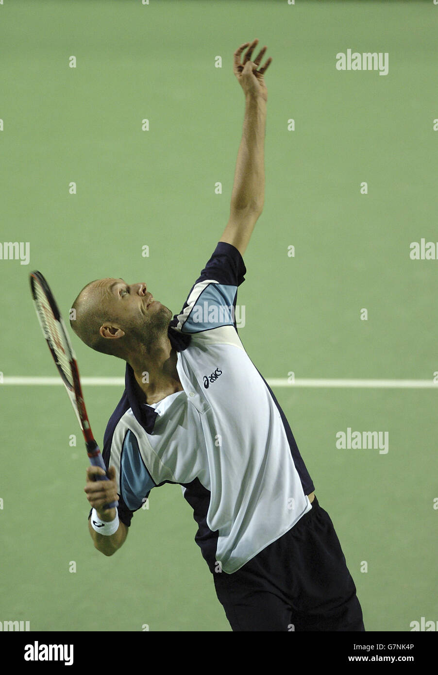 Peter wessels in action during his match against joachim johansson hi ...